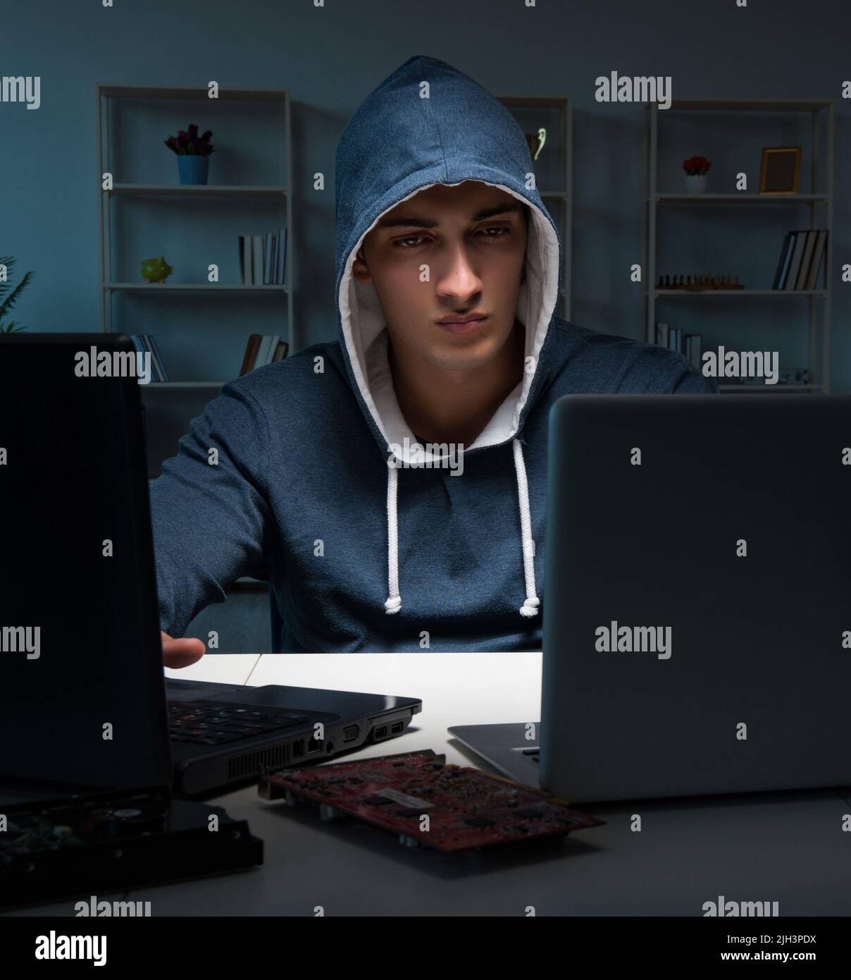 The hacker hacking computer at night Stock Photo - Alamy