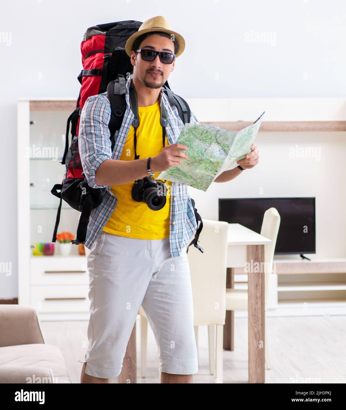 The man planning his travel with map Stock Photo - Alamy