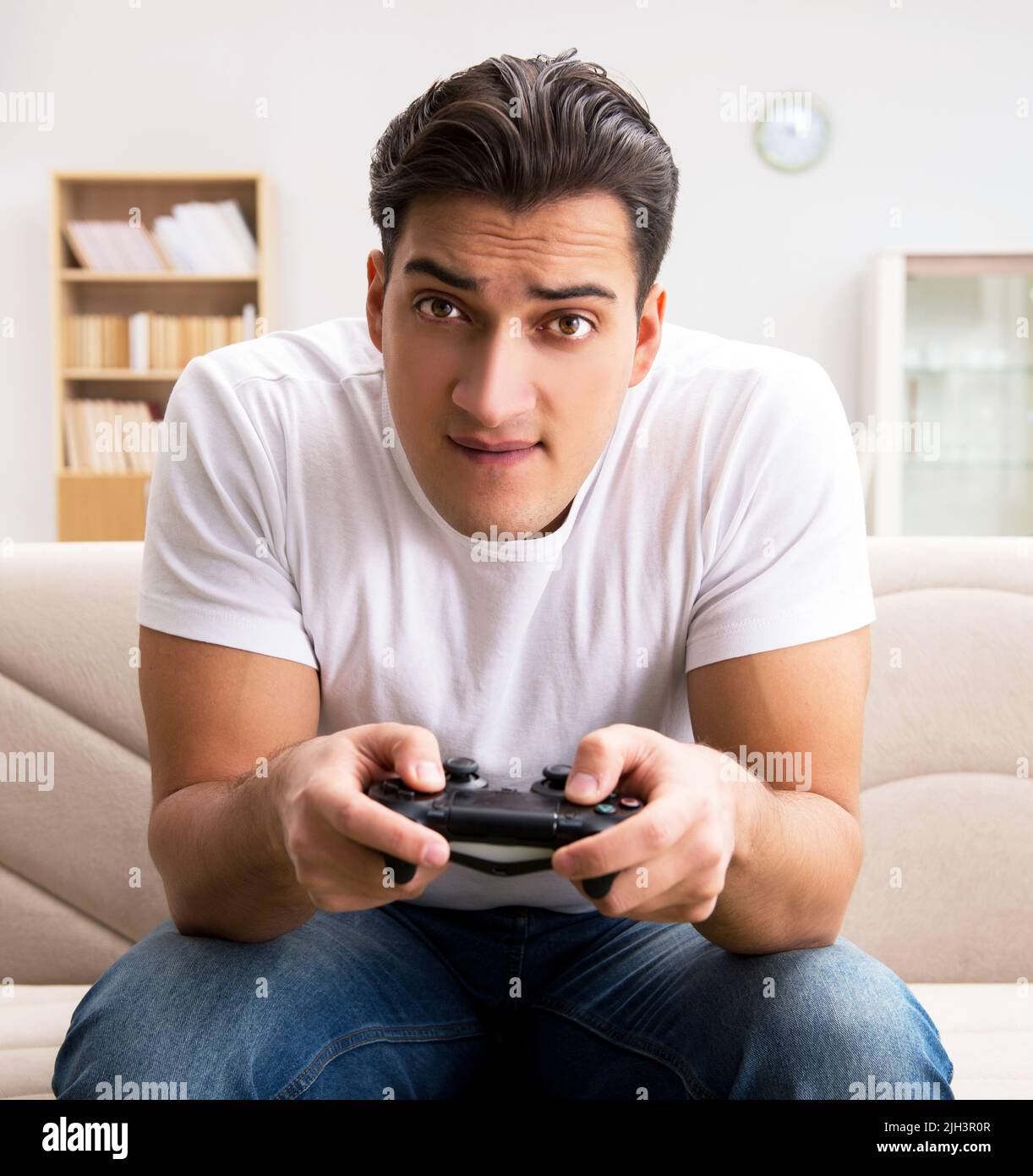 The man addicted to computer games Stock Photo - Alamy