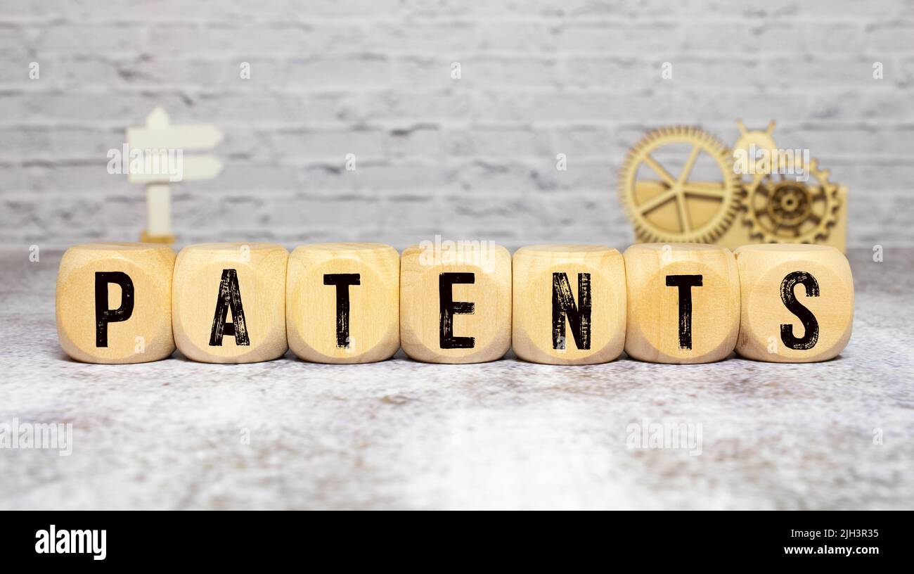 PATENT word made with wooden blocks, concept Stock Photo - Alamy