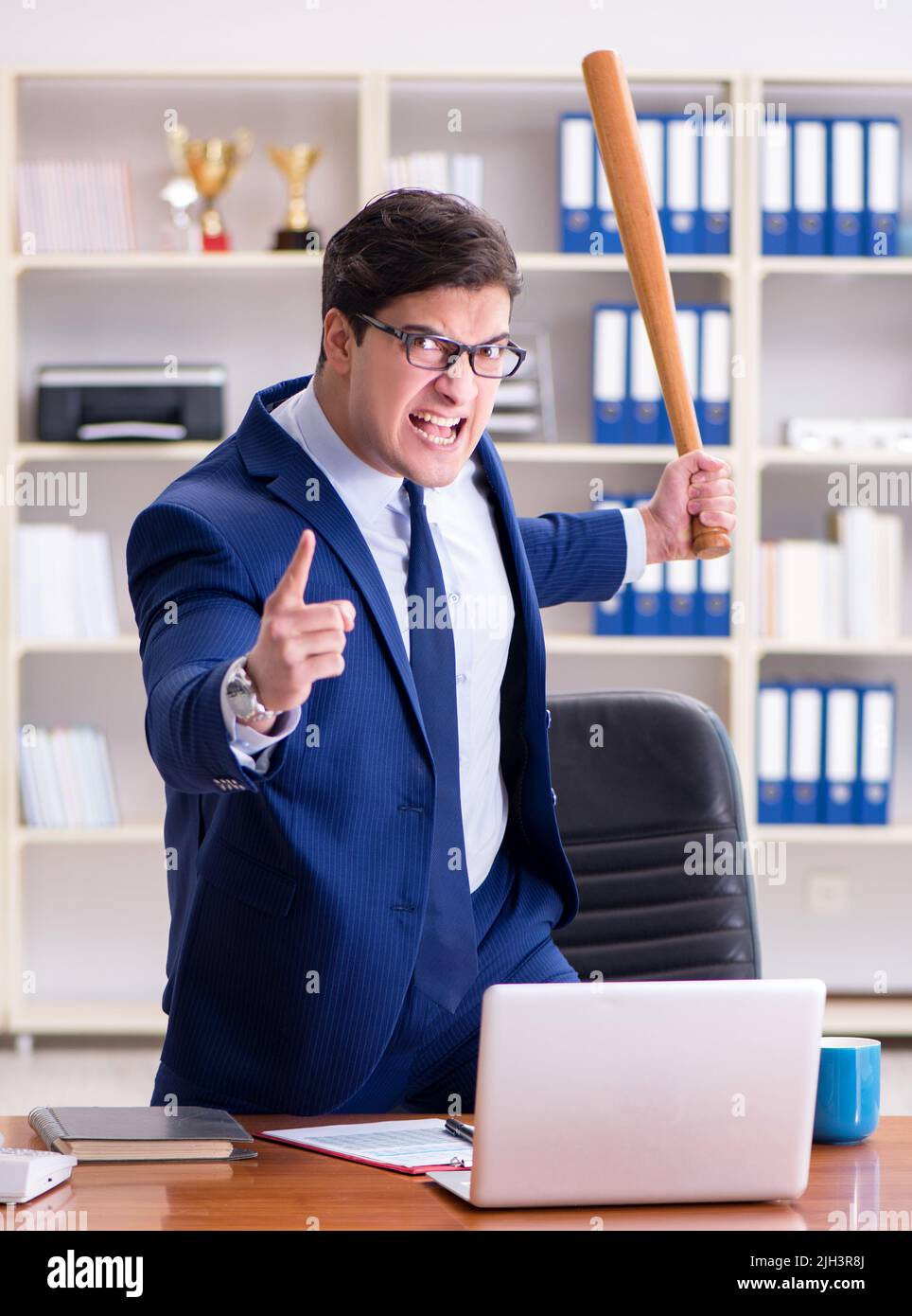The angry aggressive businessman in the office Stock Photo - Alamy