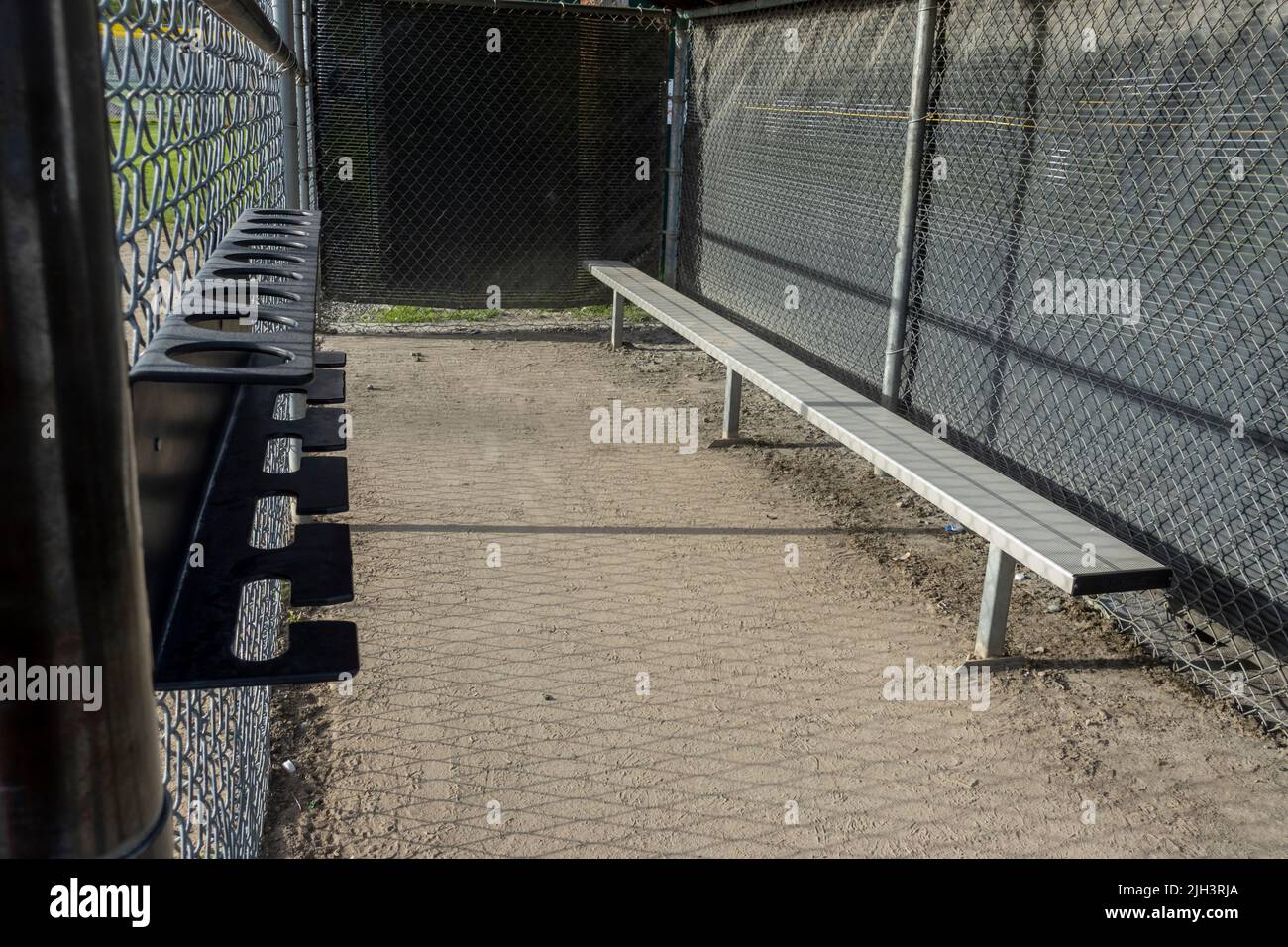 Angled view of the dugout on a baseball field, without any people ...