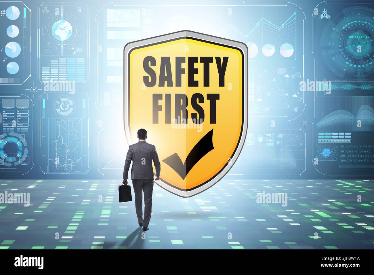 Safety first badge with the business people Stock Photo - Alamy