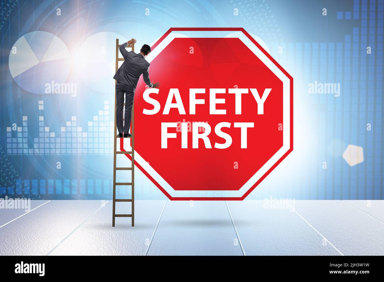 Safety first concept with the businessman Stock Photo - Alamy