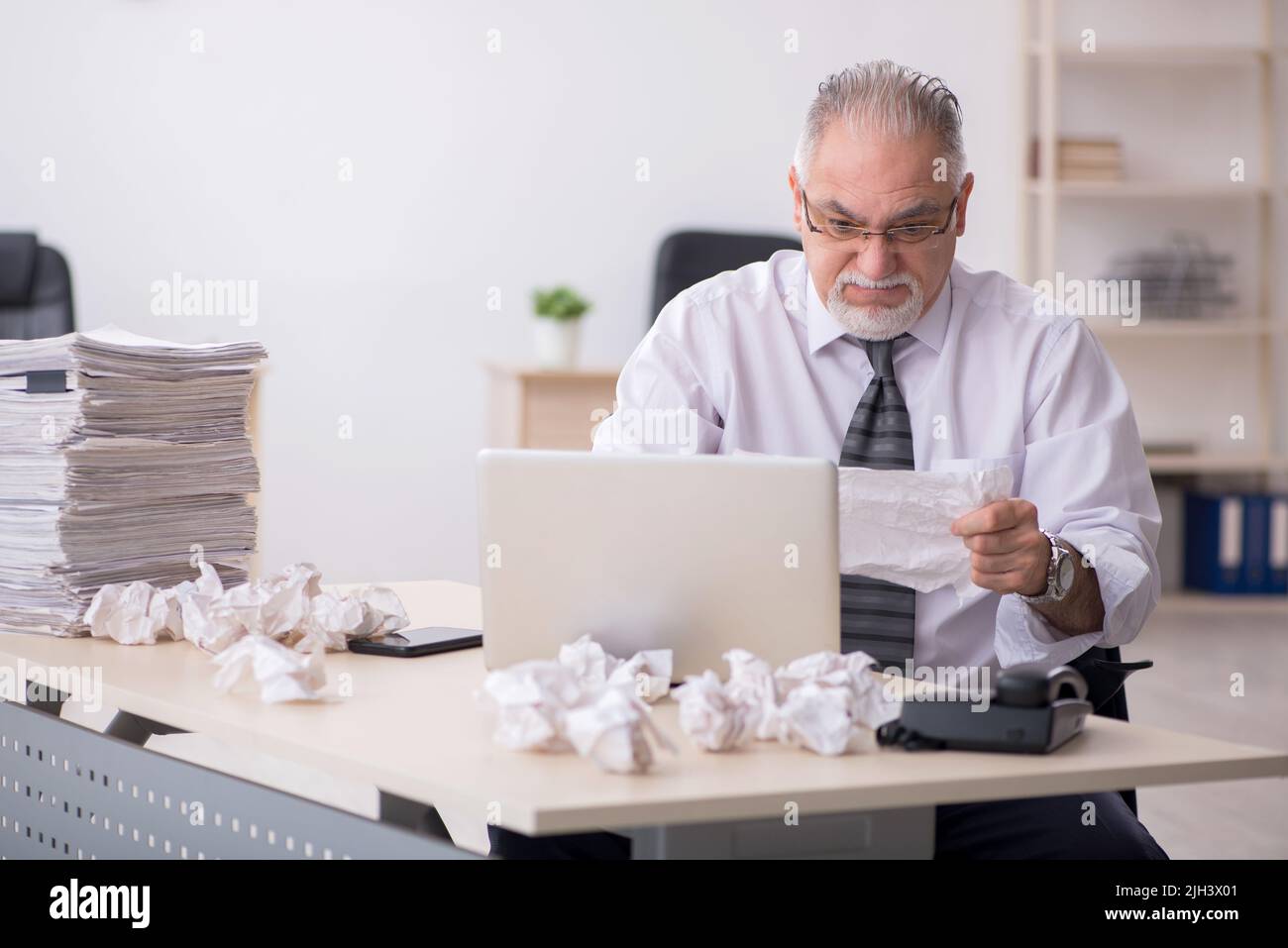 Angry businessman throwing contract in hi-res stock photography and ...
