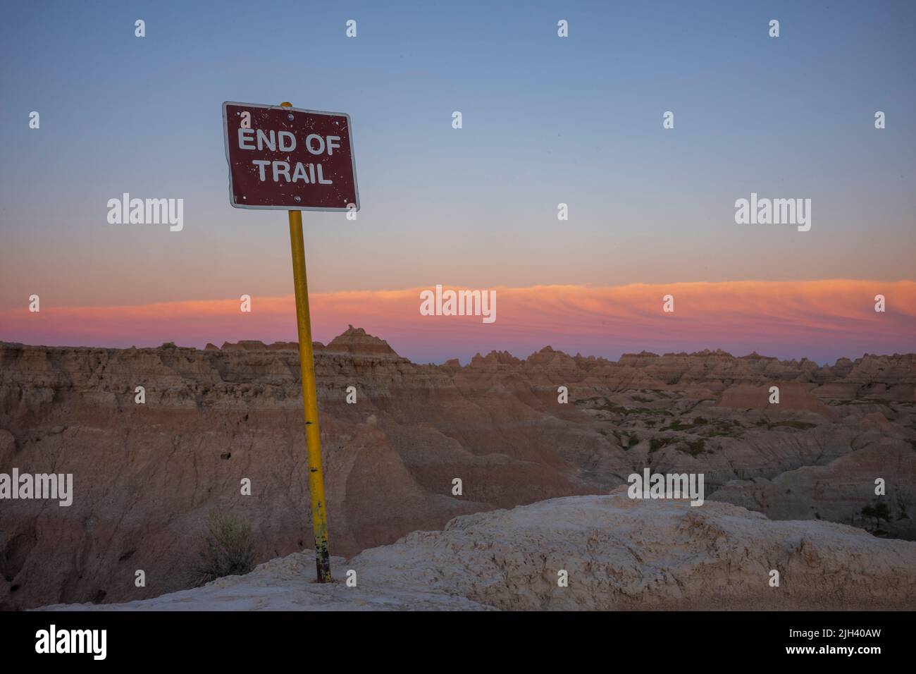 A sign marks the end of he Door Trail at Badlands National Park in ...