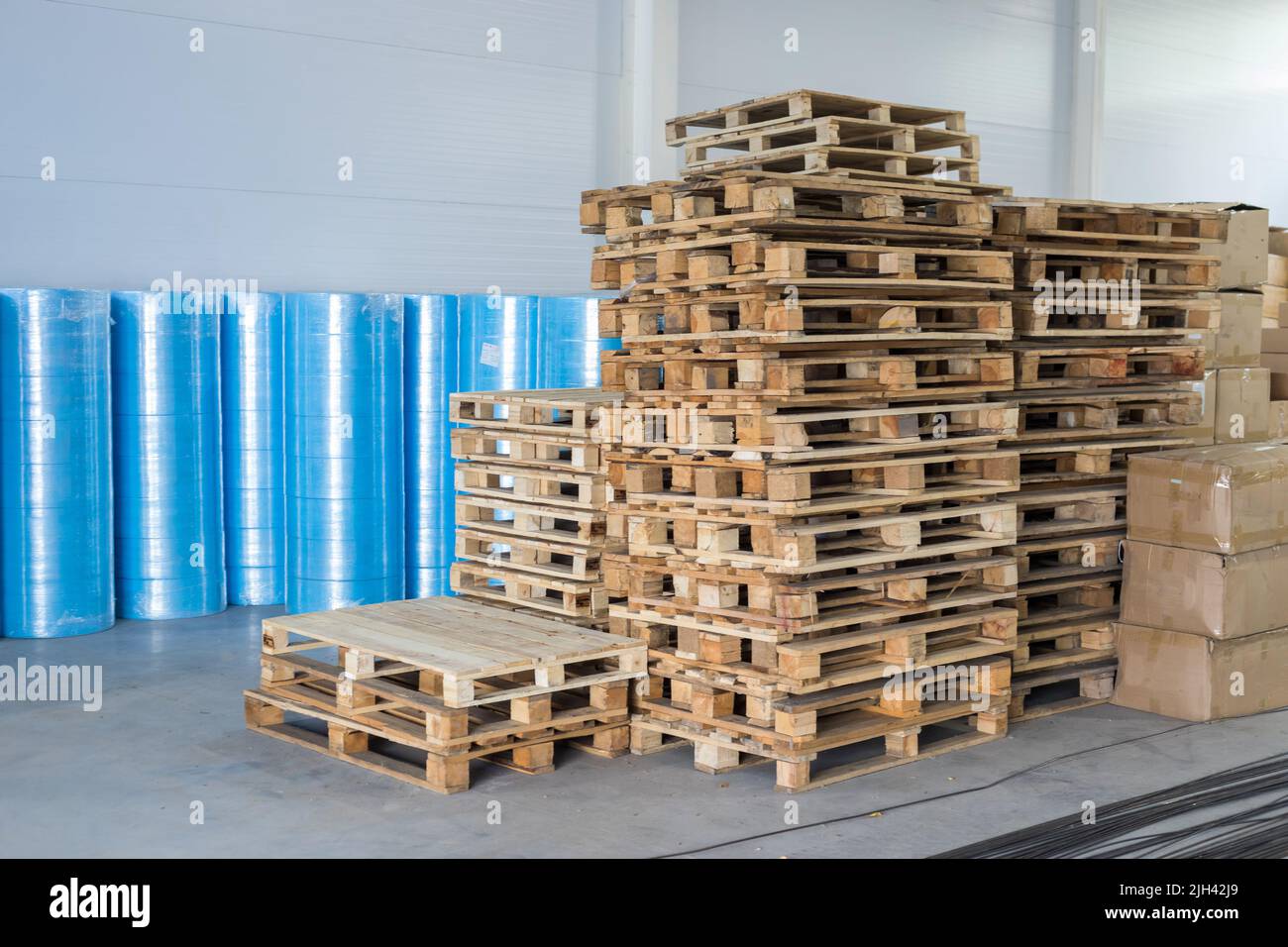 Wooden pallets stack in the warehouse. Manufactoring of medical ...