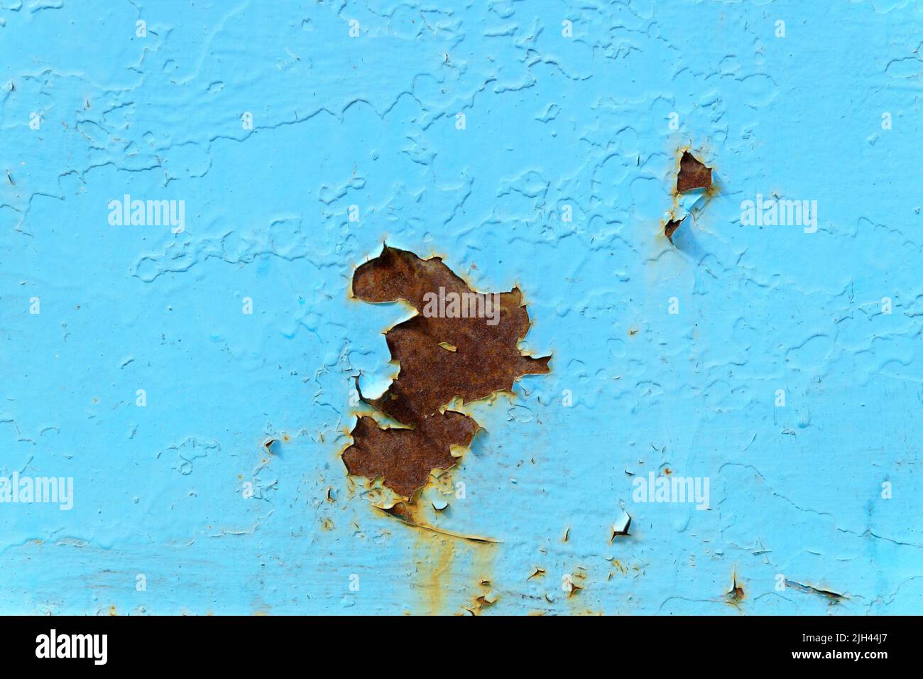 Texture of the old blue paint is a rusty surface. Grunge background ...