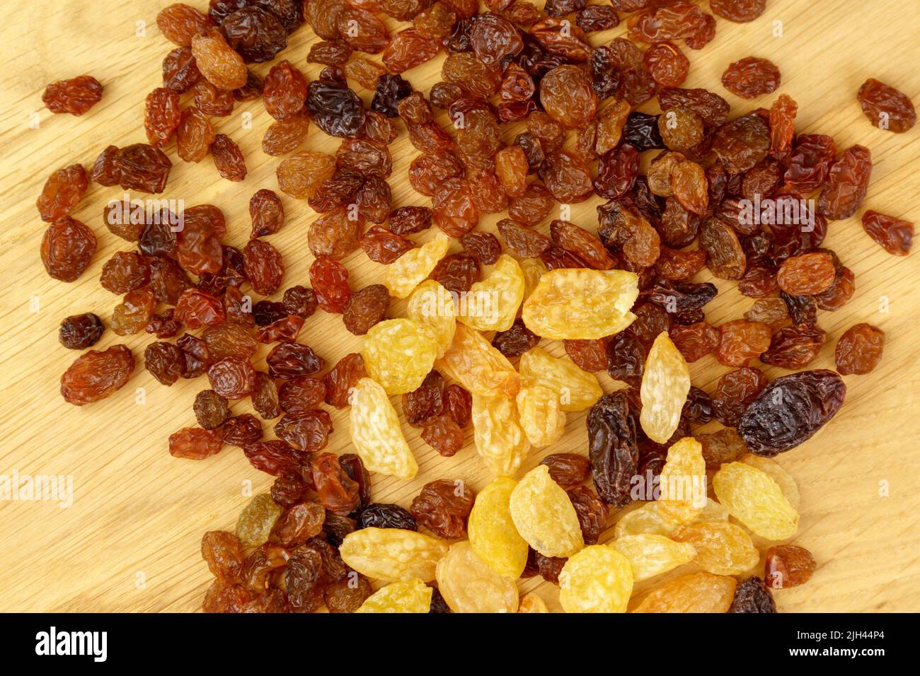 Different types of dried raisins close-up. Snacks from dried fruits ...