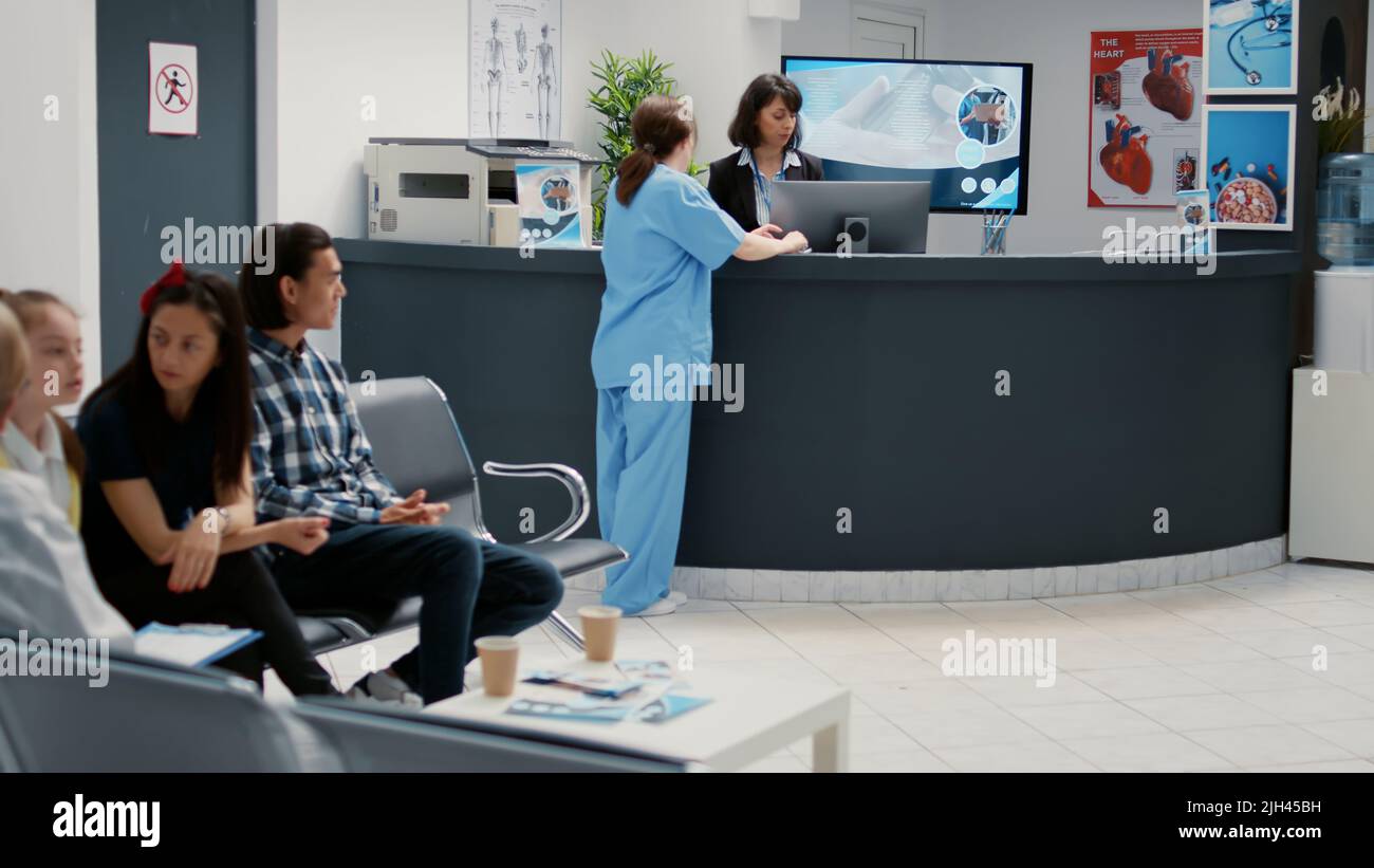 Hospital reception counter to do medical appointment registration with ...