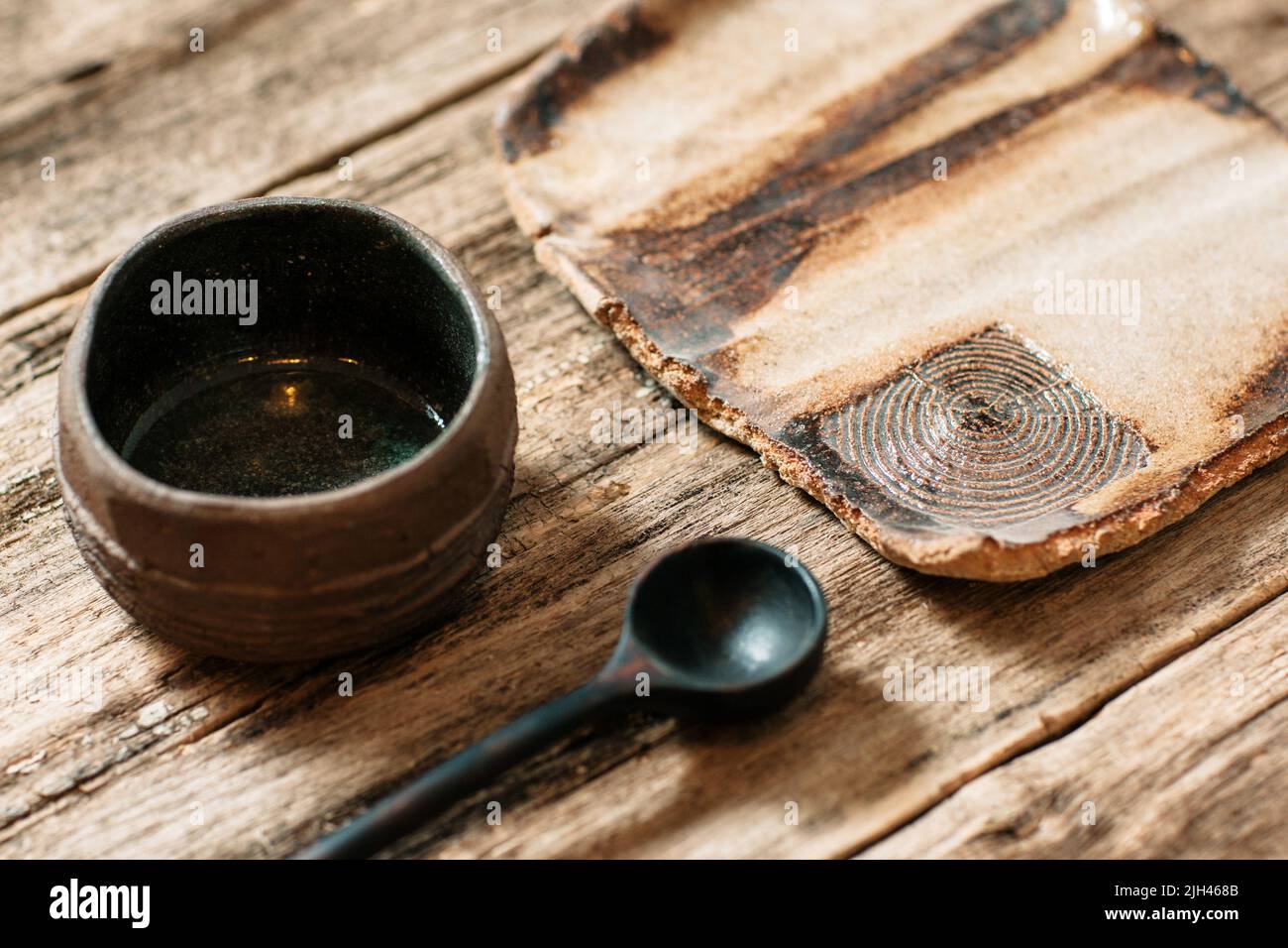 Rustic handmade eco friendly pottery crockery set Stock Photo - Alamy