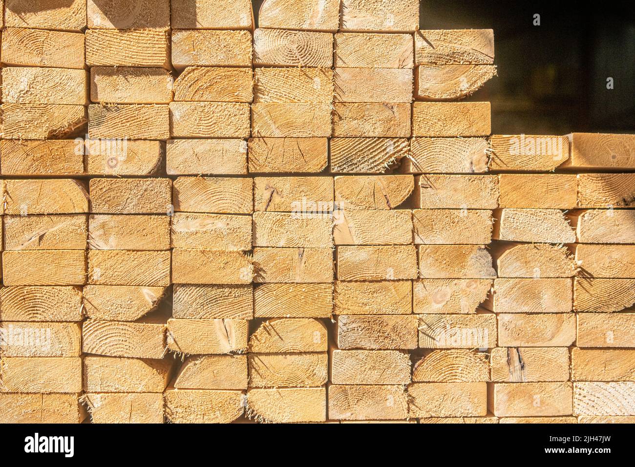 Wood Stacked in Lumberyard from a sawmill Stock Photo - Alamy