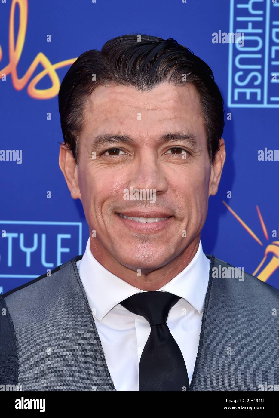 Al Coronel walking on the red carpet at the opening night red carpet ...