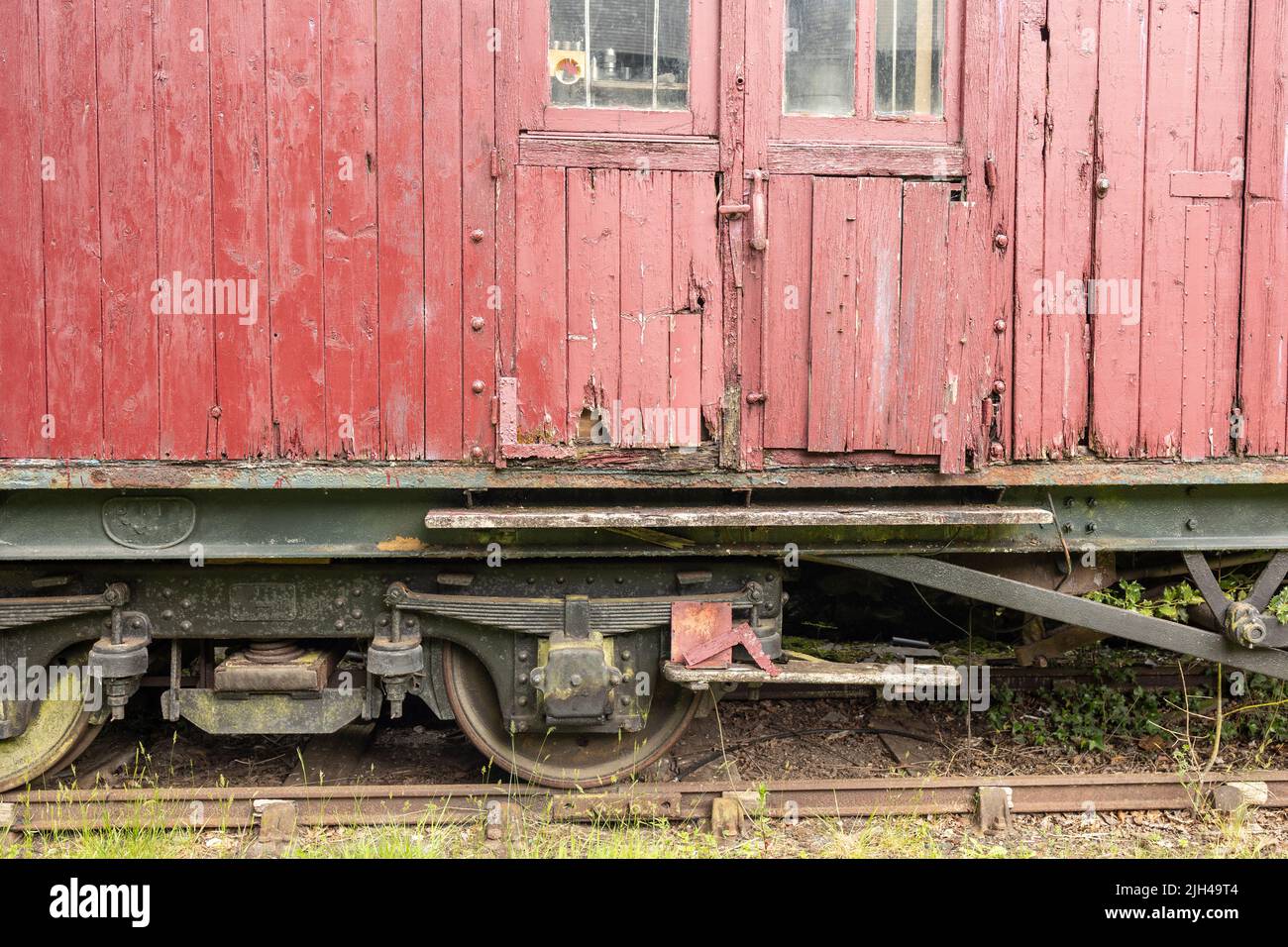 old abandoned wooden red train carriage Stock Photo - Alamy