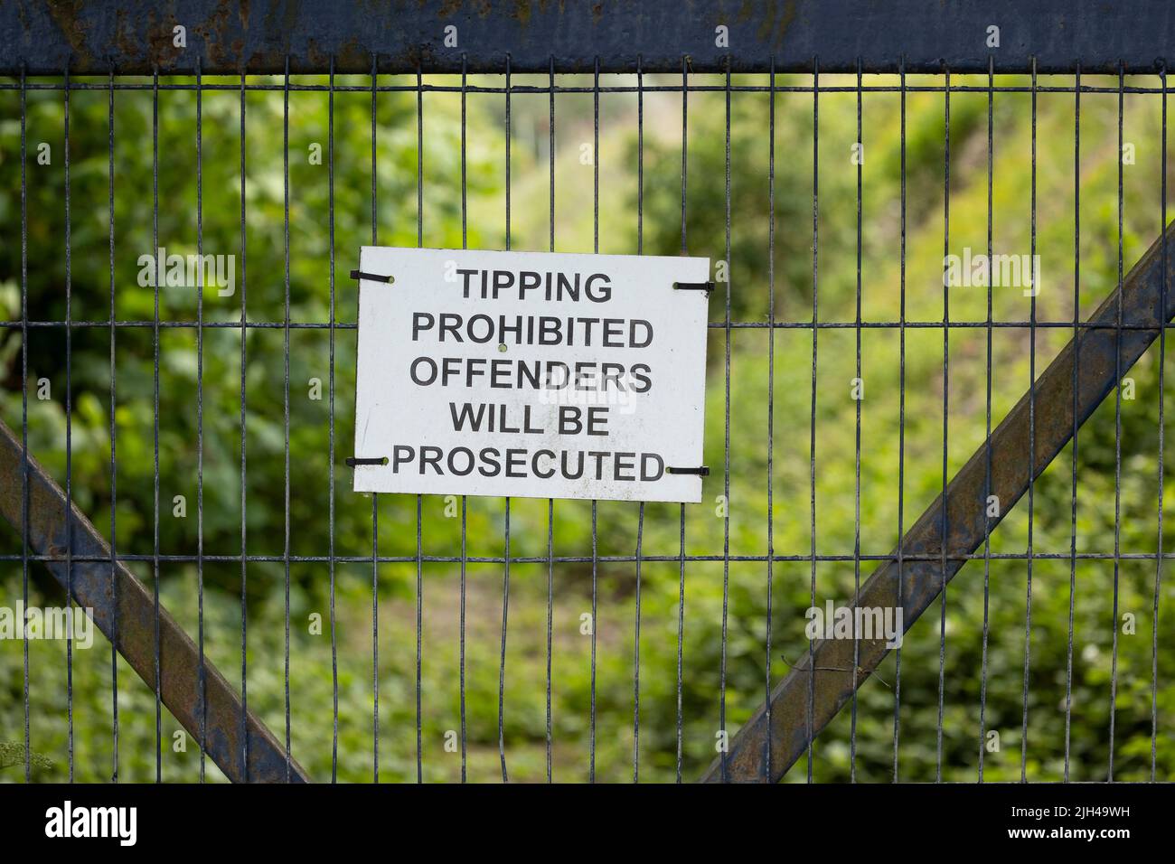Warning tipping prohibited Sign on white Stock Photo - Alamy