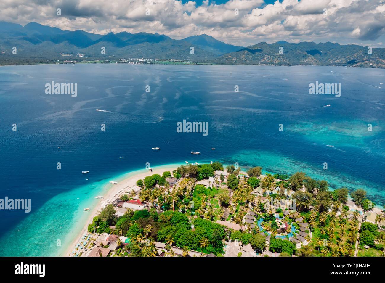 Tropical island with holiday beach and turquoise ocean, aerial view ...