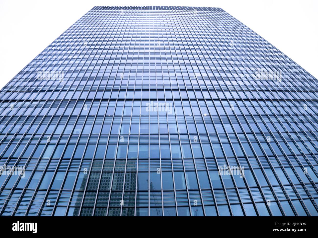 A ground perspective of some high rise buildings in the middle of a ...