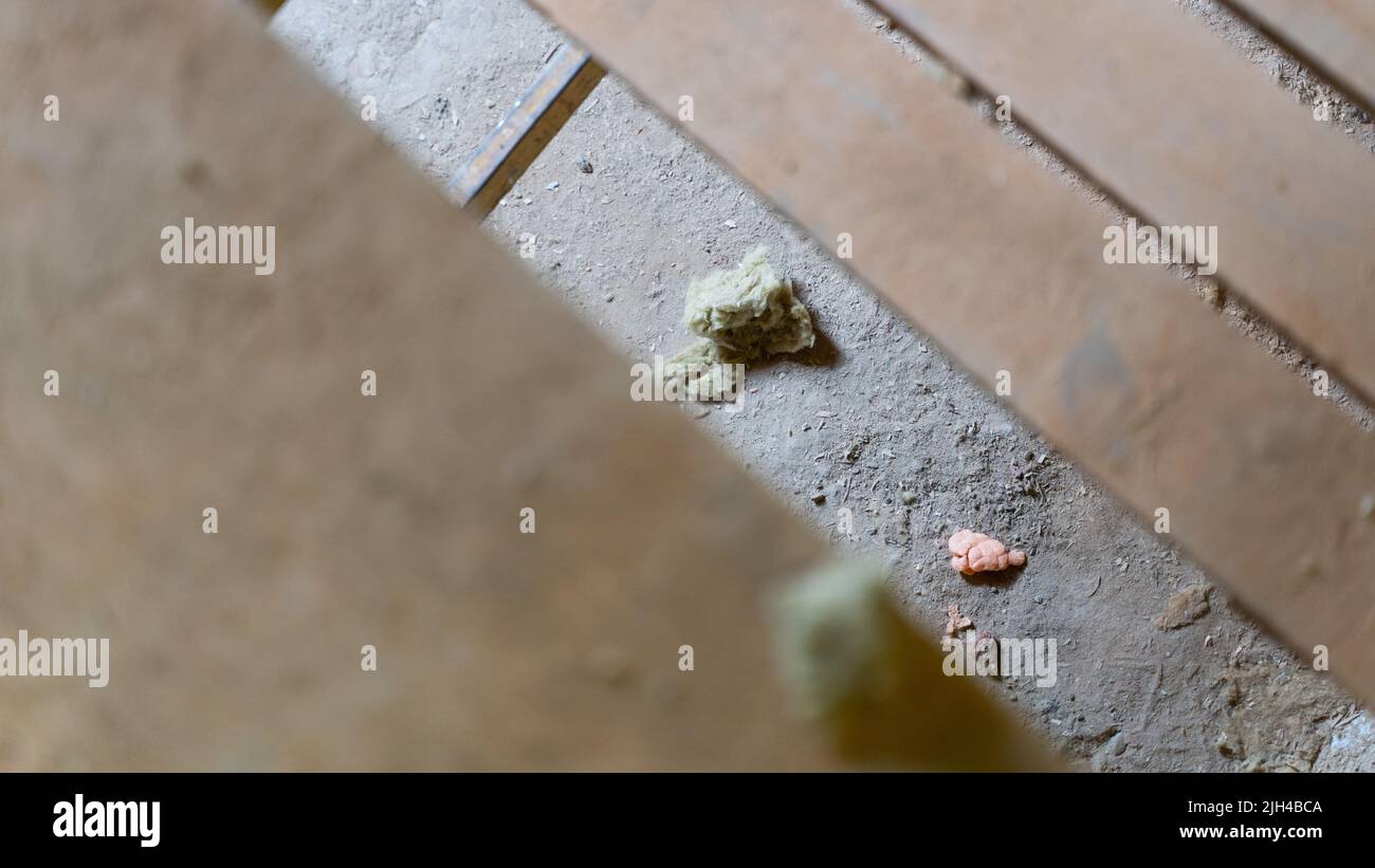 Waste and residues of mineral wool after insulation Stock Photo - Alamy