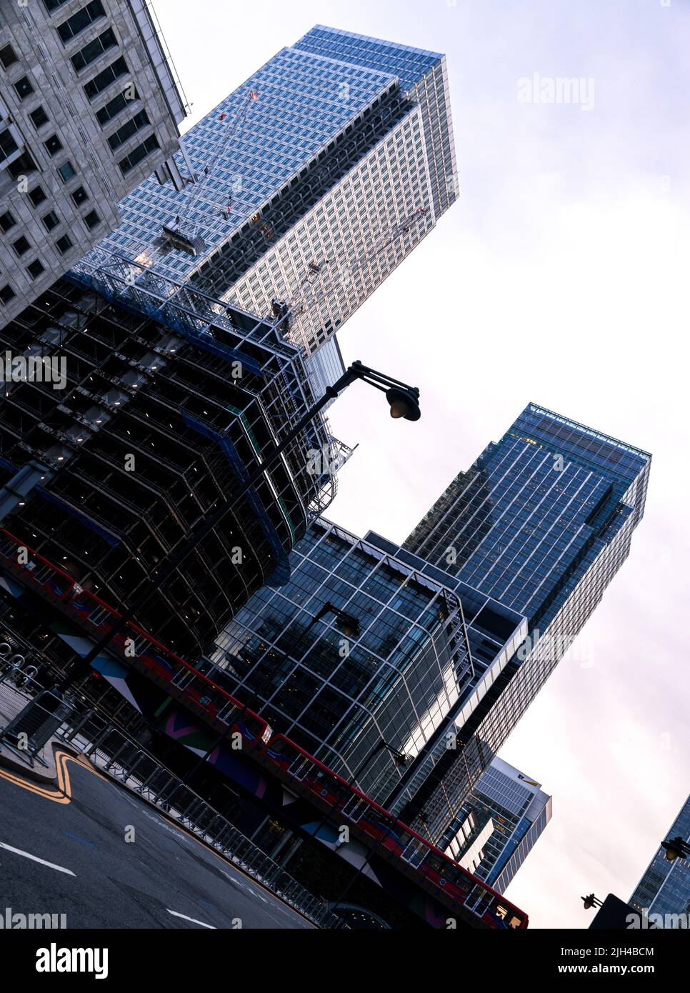 A ground perspective of some high rise buildings in the middle of a ...