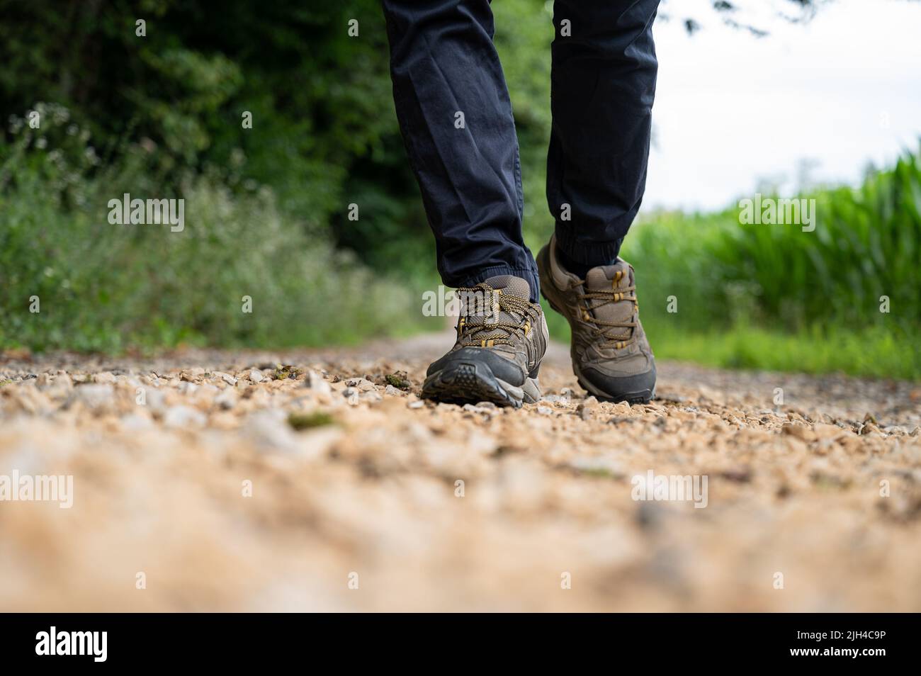 Man walking towards low angle hi-res stock photography and images - Alamy