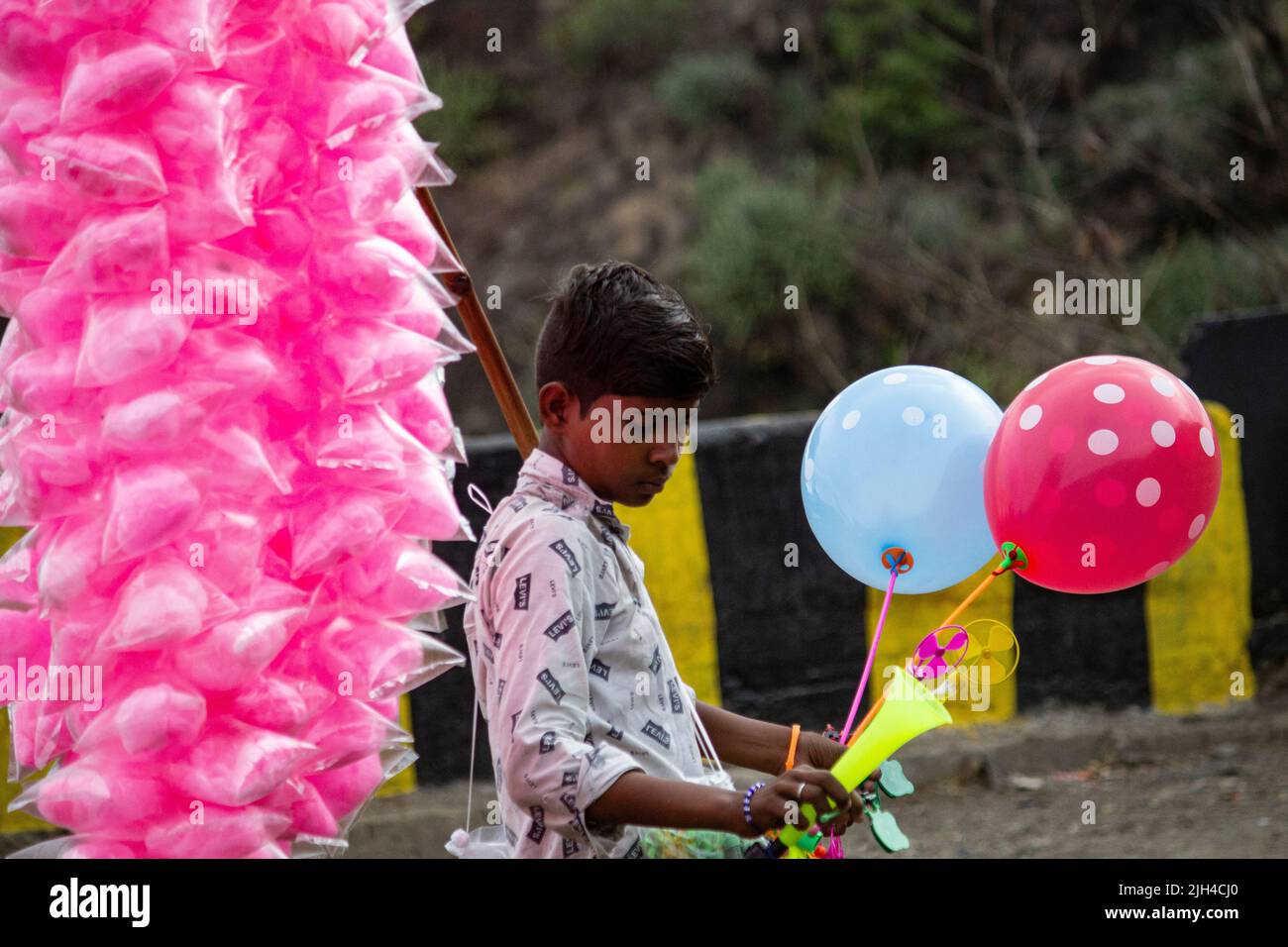 Cartoon balloons seller hi-res stock photography and images - Alamy