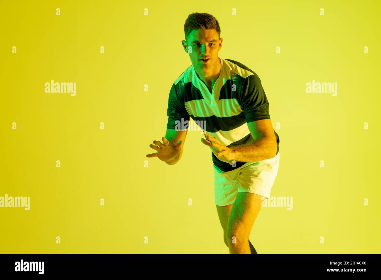 Caucasian male rugby player catching hi-res stock photography and ...