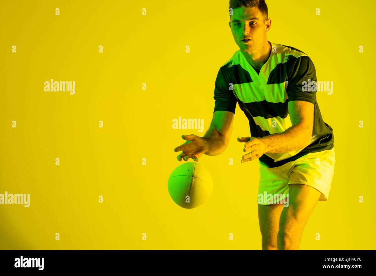 Caucasian male rugby player catching hi-res stock photography and ...
