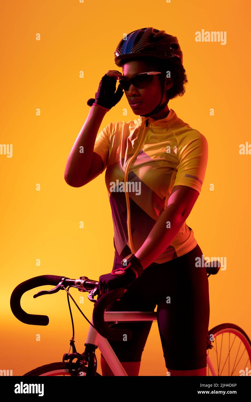 Orange cyclist hi-res stock photography and images - Alamy