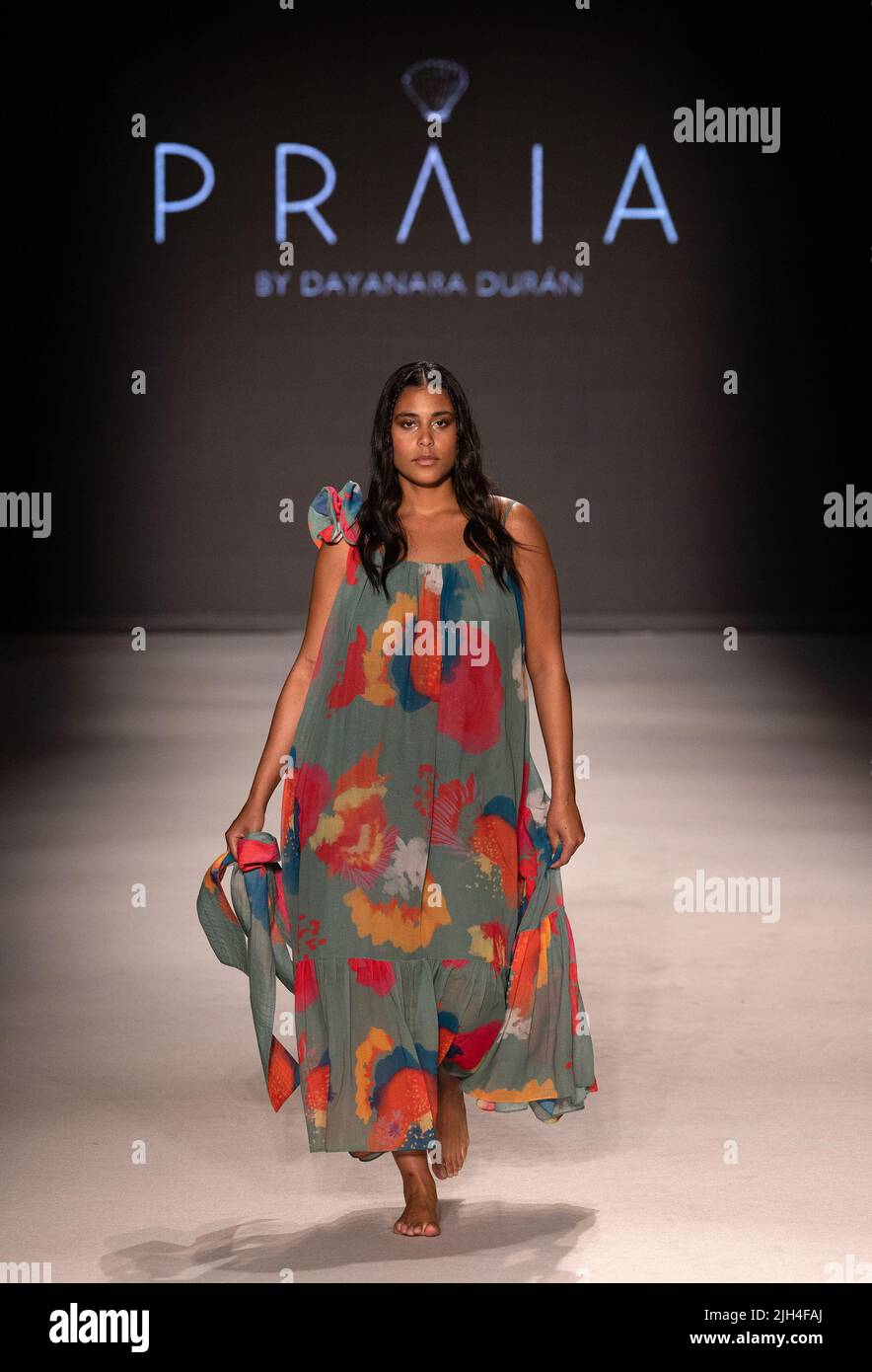 MIAMI BEACH, FLORIDA - JULY 14: A model walks the runway for Praia at ...