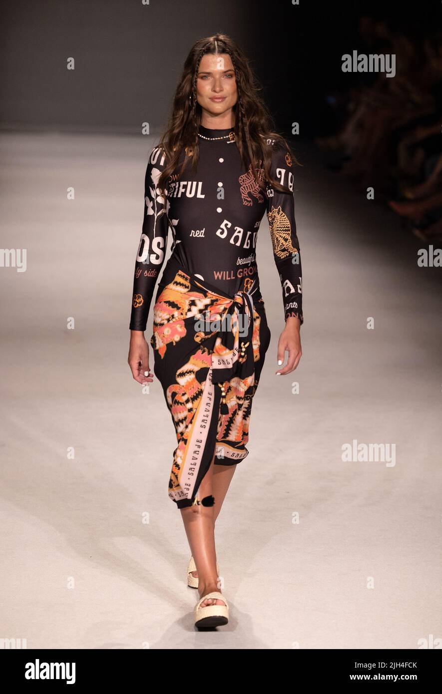 MIAMI BEACH, FLORIDA - JULY 14: A model walks the runway for Smeralda ...