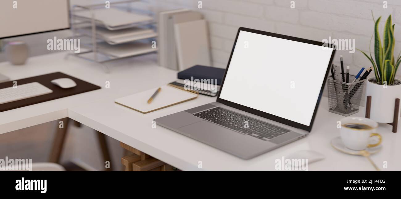 Modern Office Desk Workspace With Notebook Laptop Computer White Screen