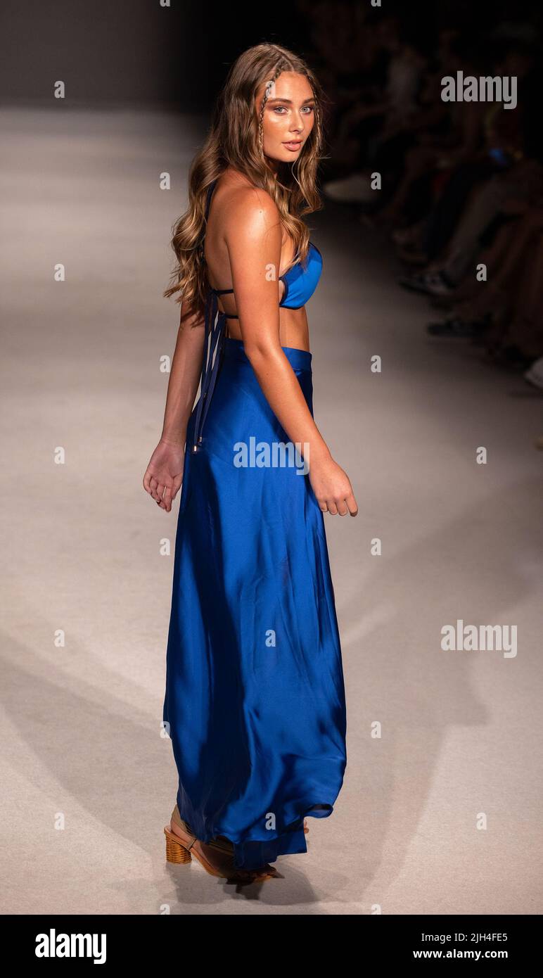MIAMI BEACH, FLORIDA - JULY 14: A model walks the runway for Punta Mar ...