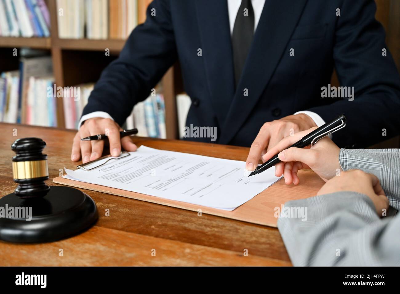 Professional and formal male lawyer or attorney in formal suit having a ...