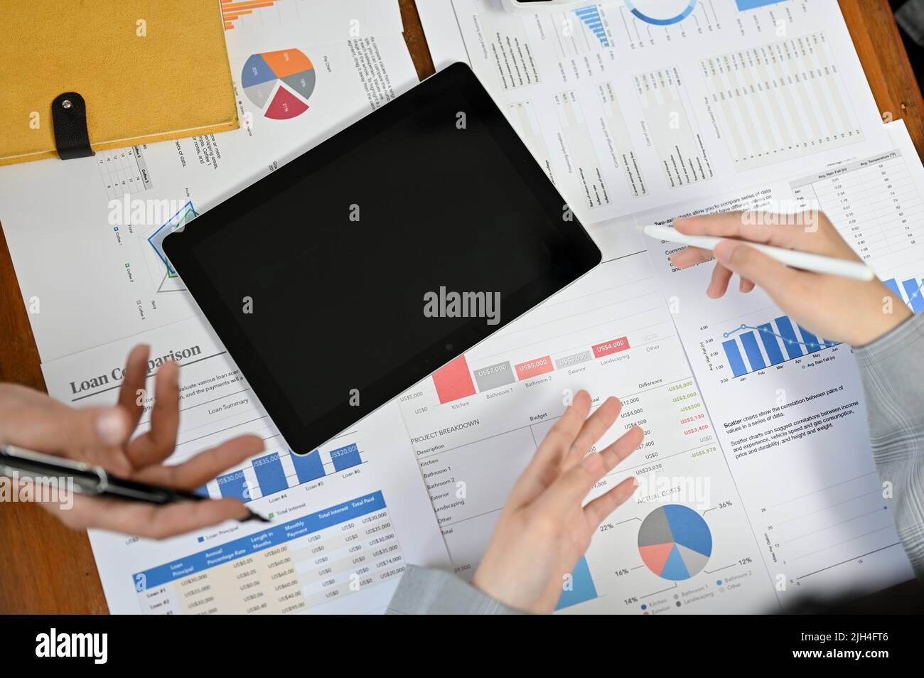 Above view, A group of business financial team brainstorming, analysing ...