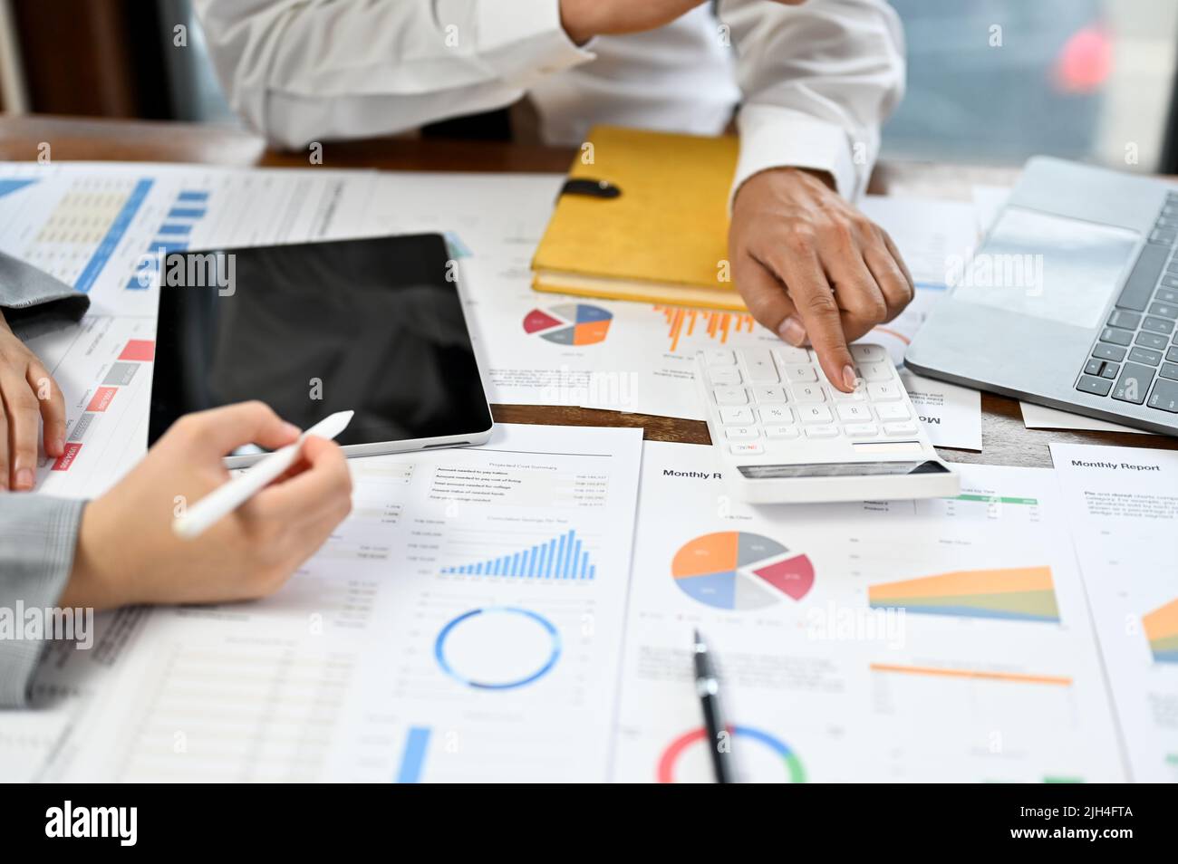 Above view, A group of business financial team brainstorming, analysing ...