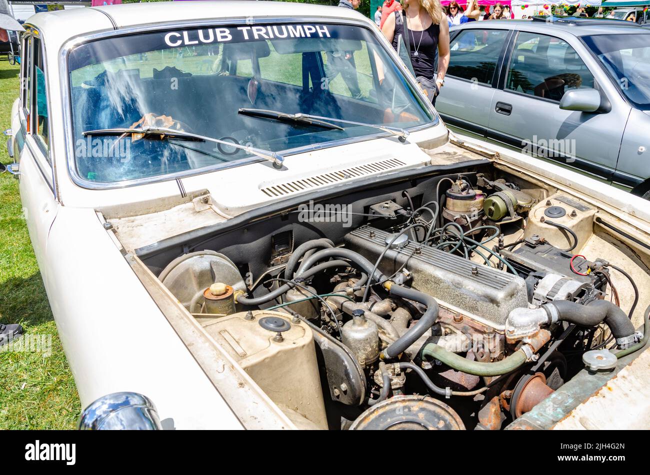 Front view of a 1975 Triumph 2500S in white with the bonnet up showing ...