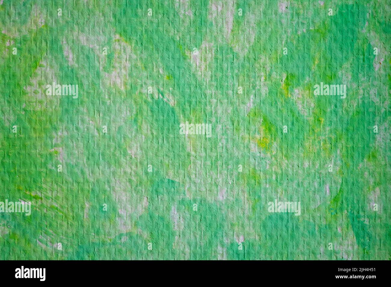 Light green spotted textured surface. Soft focus Stock Photo - Alamy