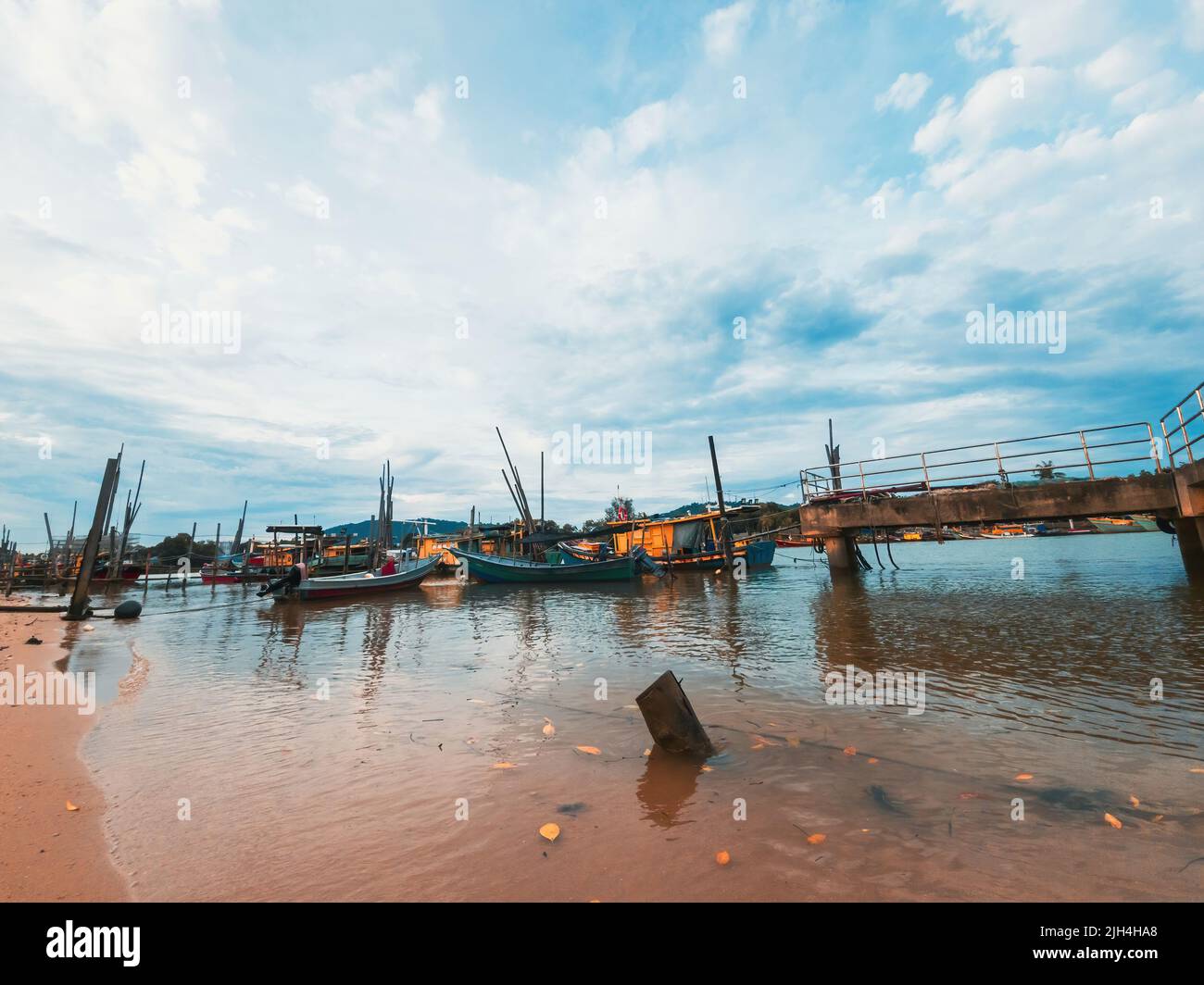 LOw angle of the fisherman village during sunset in Kuantan, Pahang ...