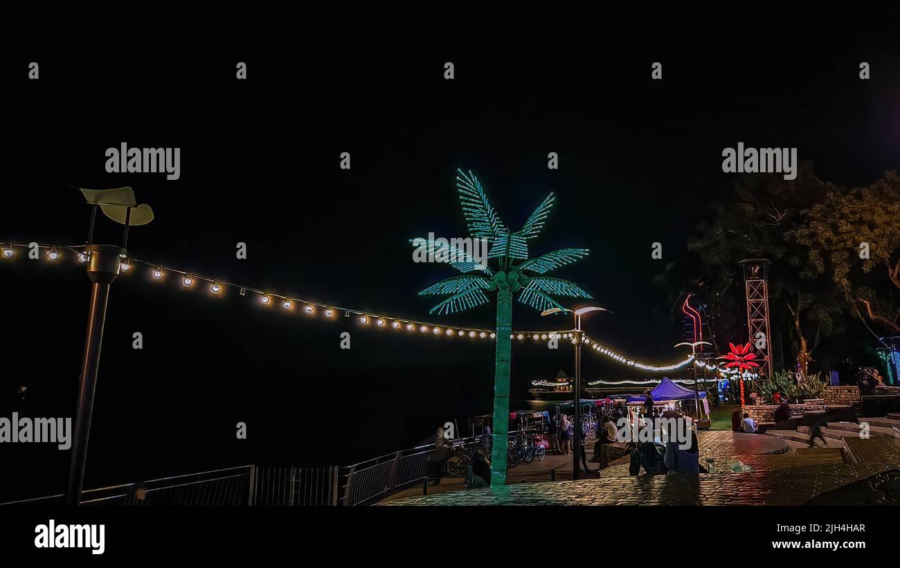 Kuantan, Malaysia - May 12, 2022: Wrapping outdoor trees with colourful ...