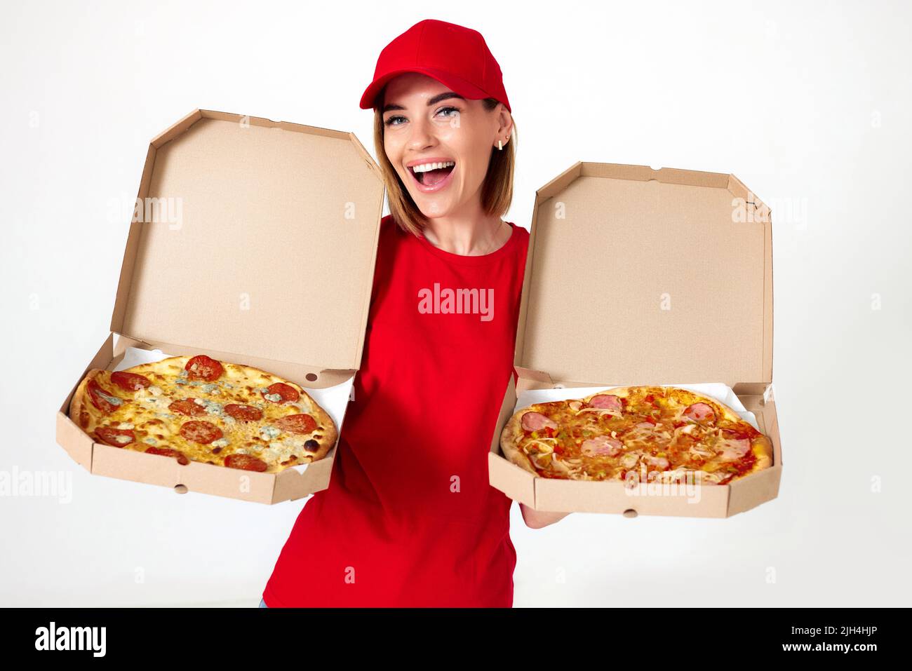 pizza delivery girl showing pizza inside boxes Stock Photo - Alamy