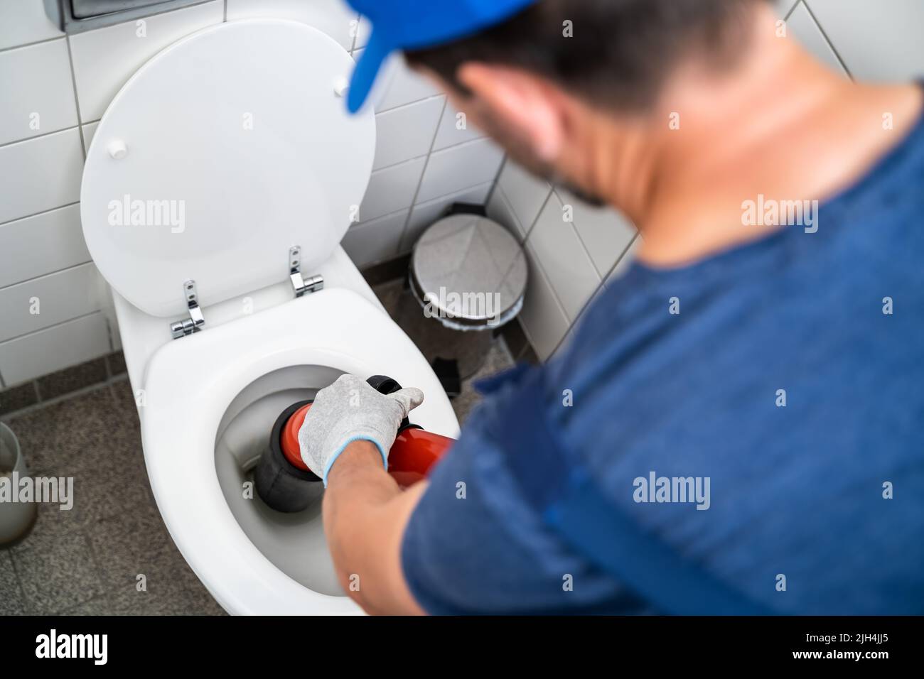 Plumber toilet hi-res stock photography and images - Alamy
