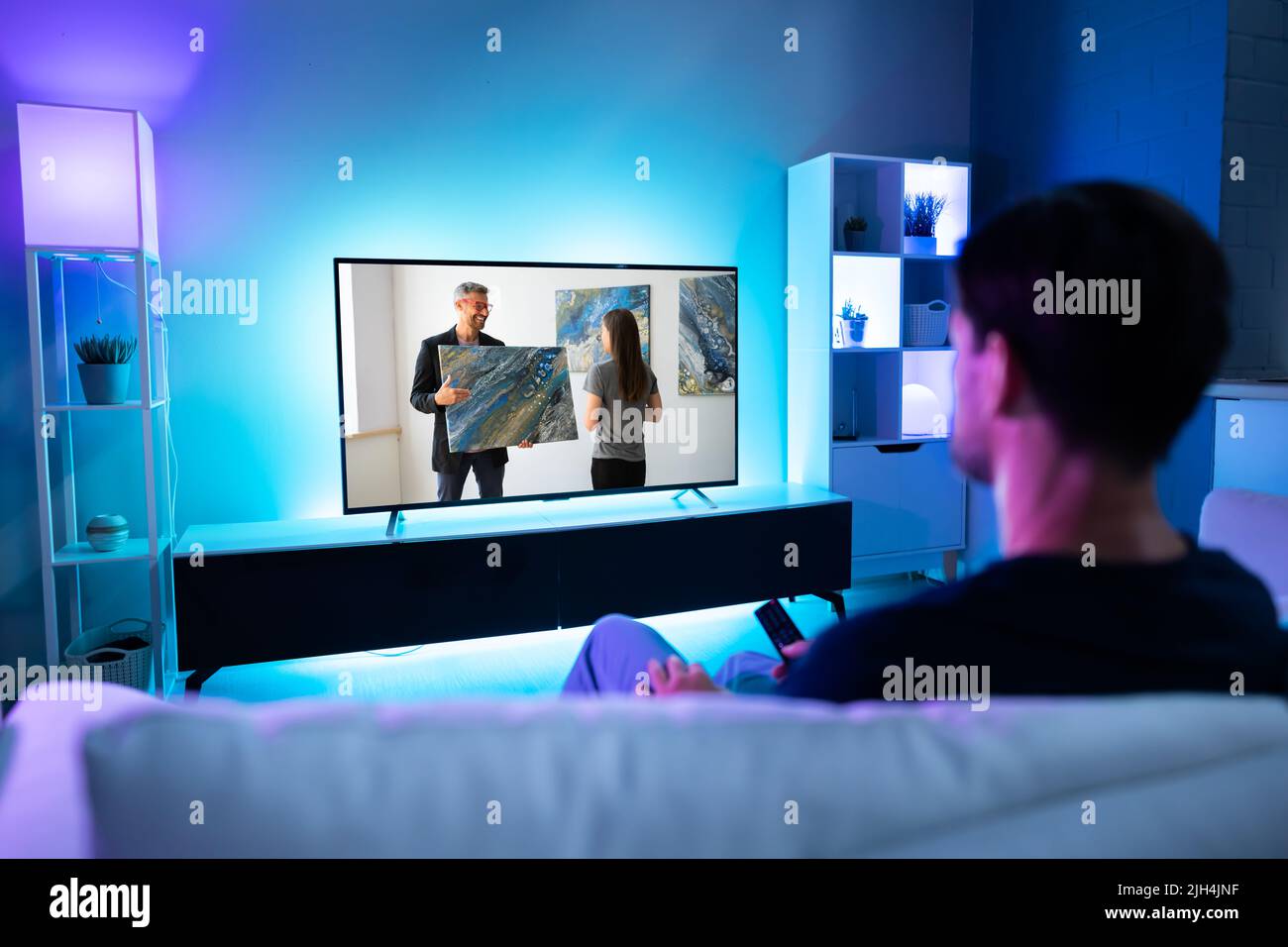 Streaming And Watching Movie On TV Screen Stock Photo - Alamy