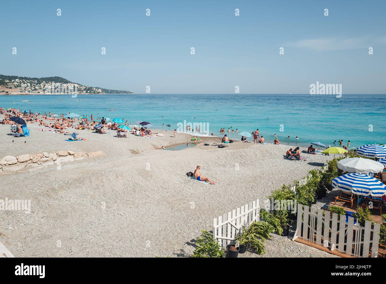 Nice, France-June 2022: life by The beautiful stone beach Stock Photo ...