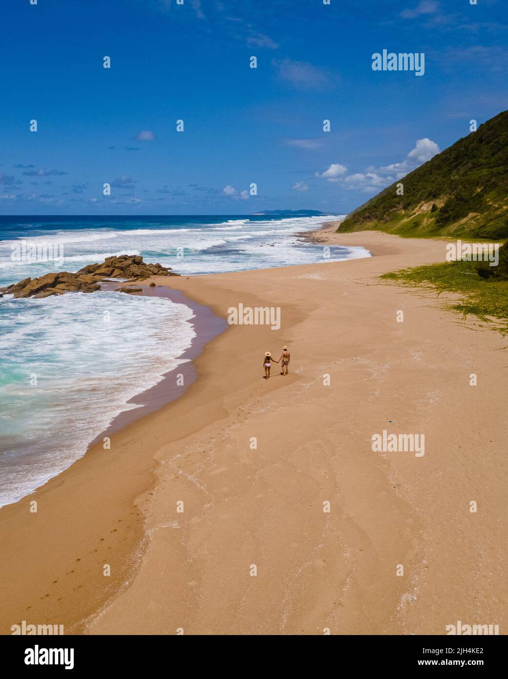 St Lucia South Africa, men and woman walking at the beach Mission Rocks ...