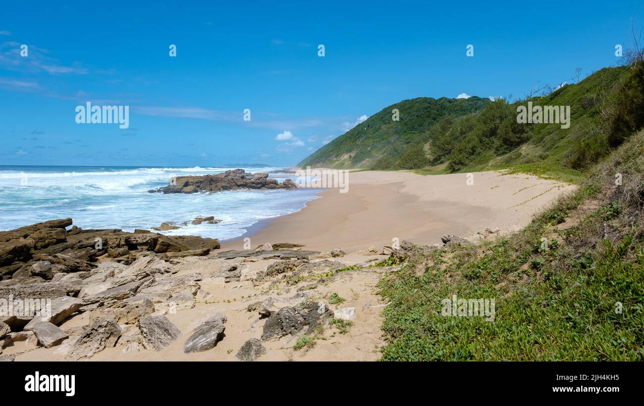 St Lucia South Africa, Rocks sand ocean, and blue coastal skyline at ...