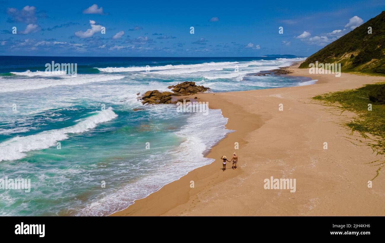 St Lucia South Africa, men and woman walking at the beach Mission Rocks ...