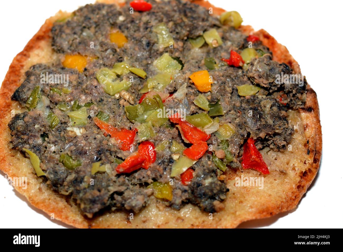 Traditional Egyptian dish Hawawshi, pita stuffed with minced meat and ...