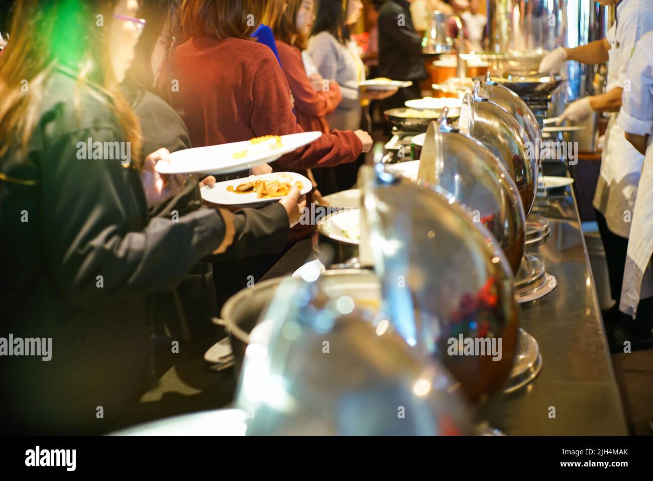 People group grab buffet food in restaurant after seminar Stock Photo ...
