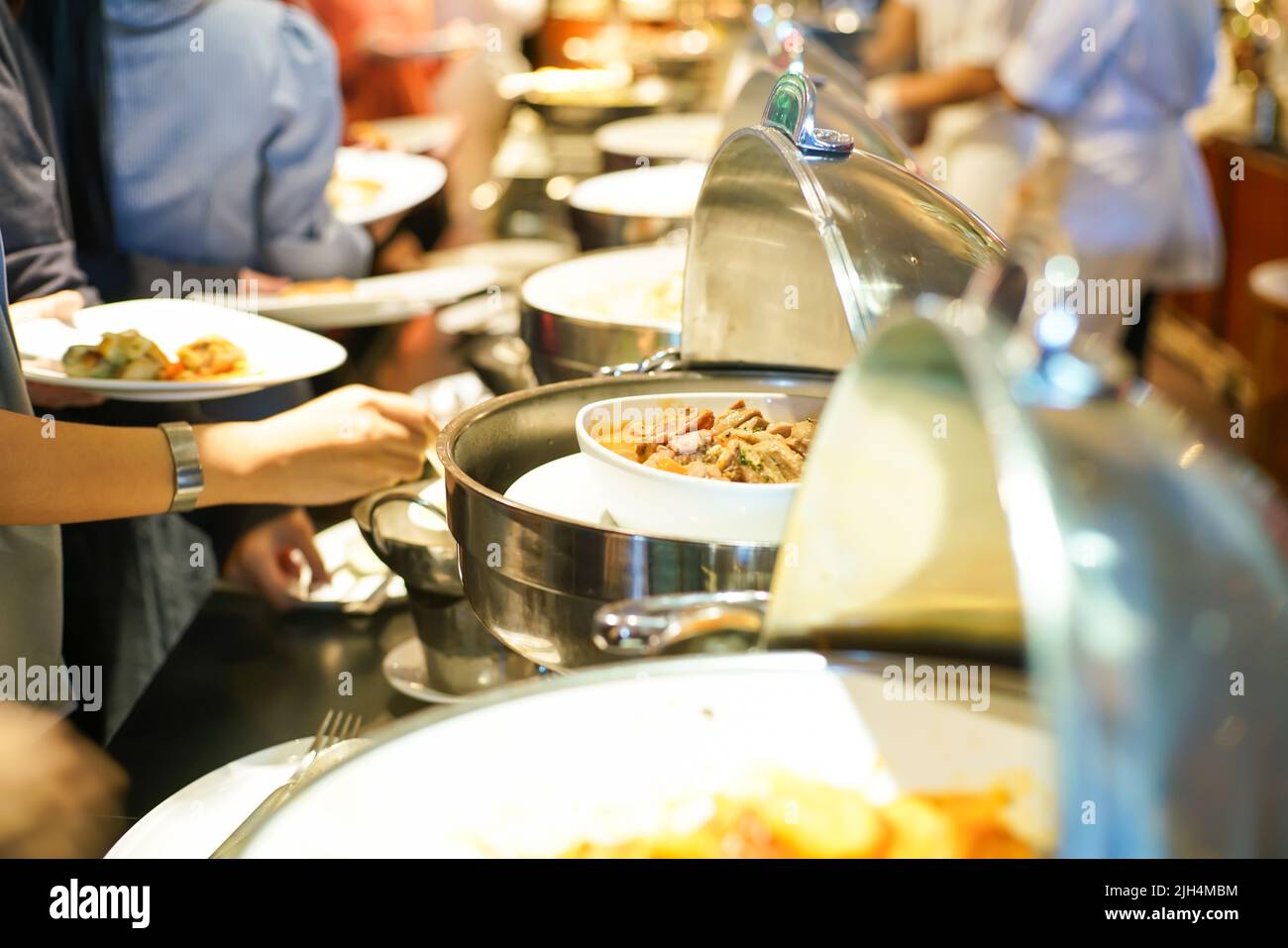 People group grab buffet food in restaurant after seminar Stock Photo ...