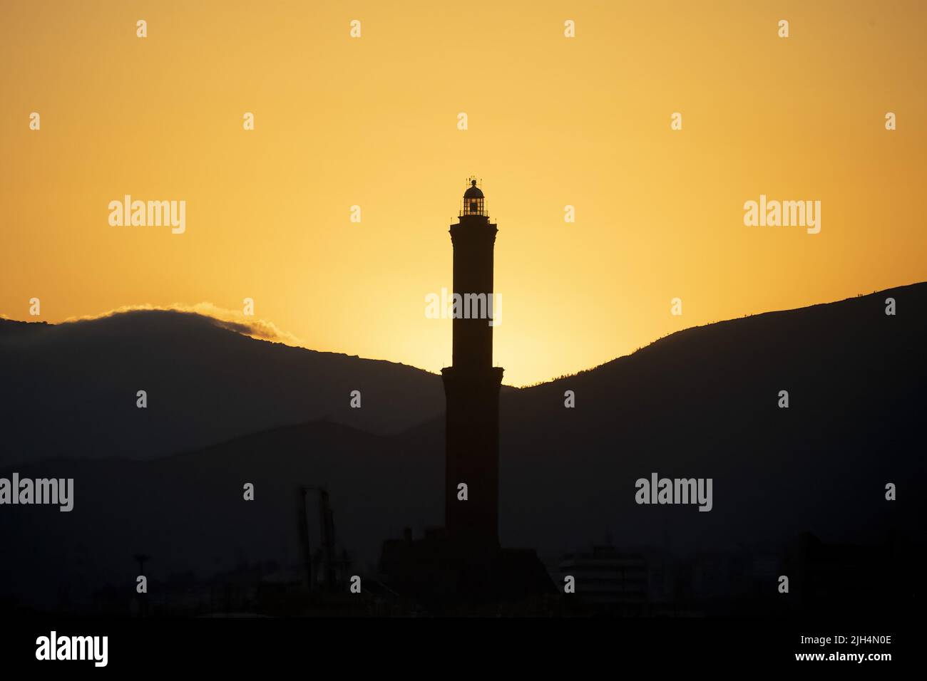 Genoa lanterna famous lighthouse city symbol silhouette at golden ...